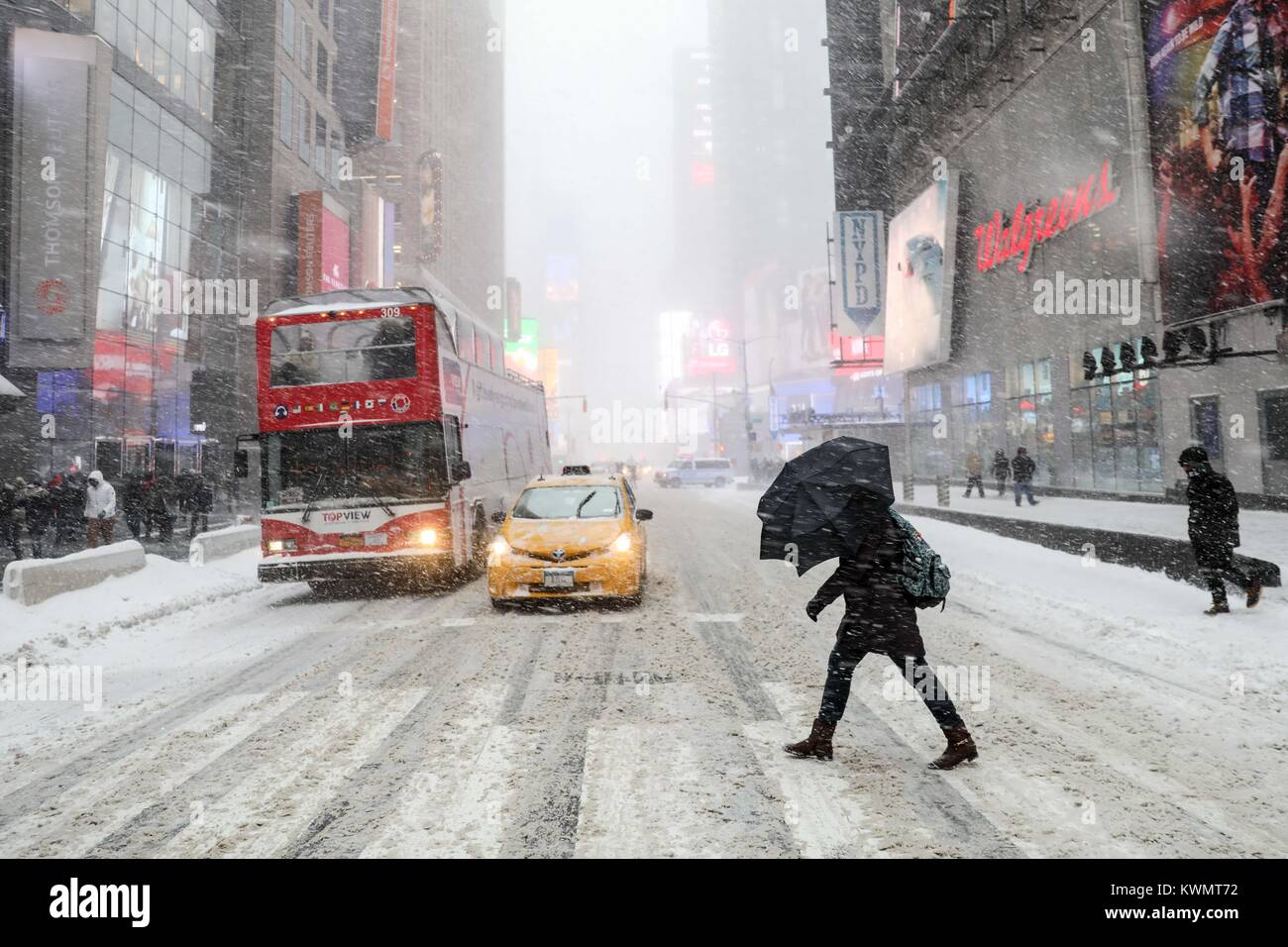 Times Square on a day when heavy snowfall hits Manhattan Island in New ...