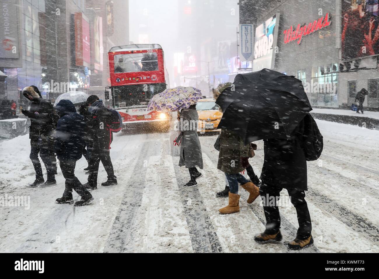 Times Square on a day when heavy snowfall hits Manhattan Island in New ...