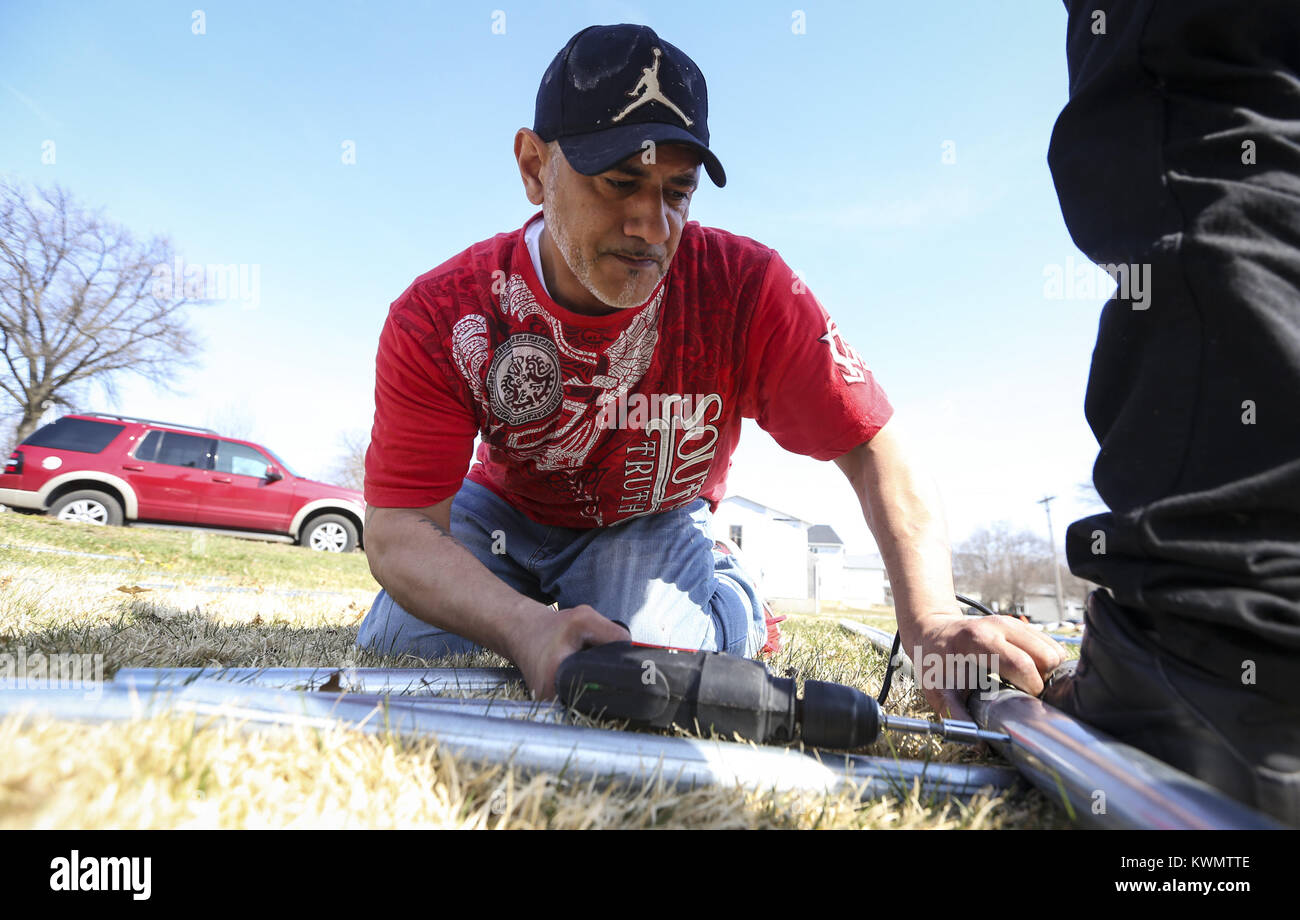 Davenport, Iowa, USA. 20th Mar, 2017. Ivan Cardona of Smitty's Lawn ...
