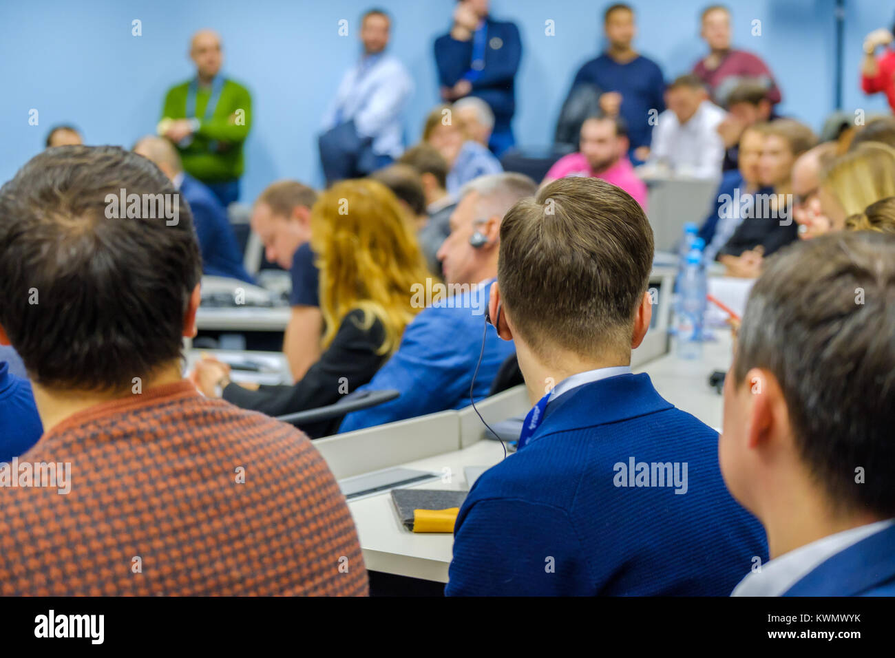 People attend business conference in congress hall Stock Photo - Alamy