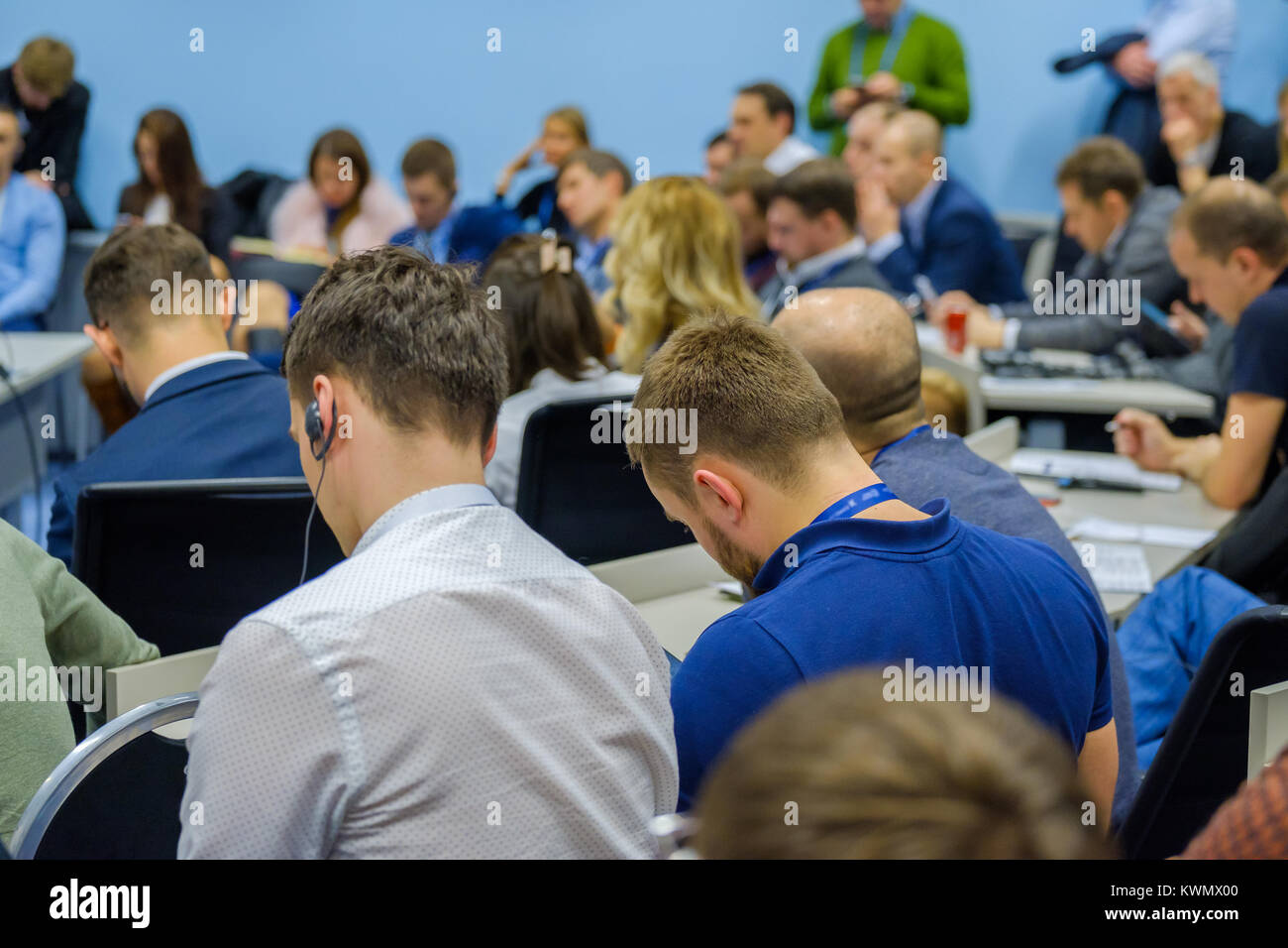 People attend business conference in congress hall Stock Photo - Alamy