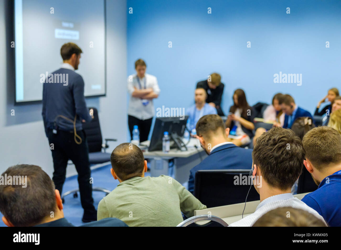 People attend business conference in congress hall Stock Photo - Alamy