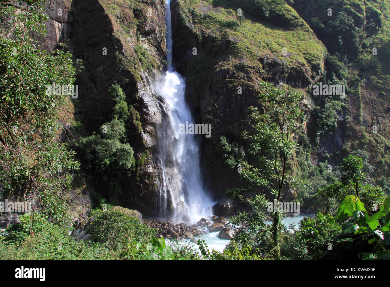Small waterfall and rocks in mountain in Nepal Stock Photo - Alamy