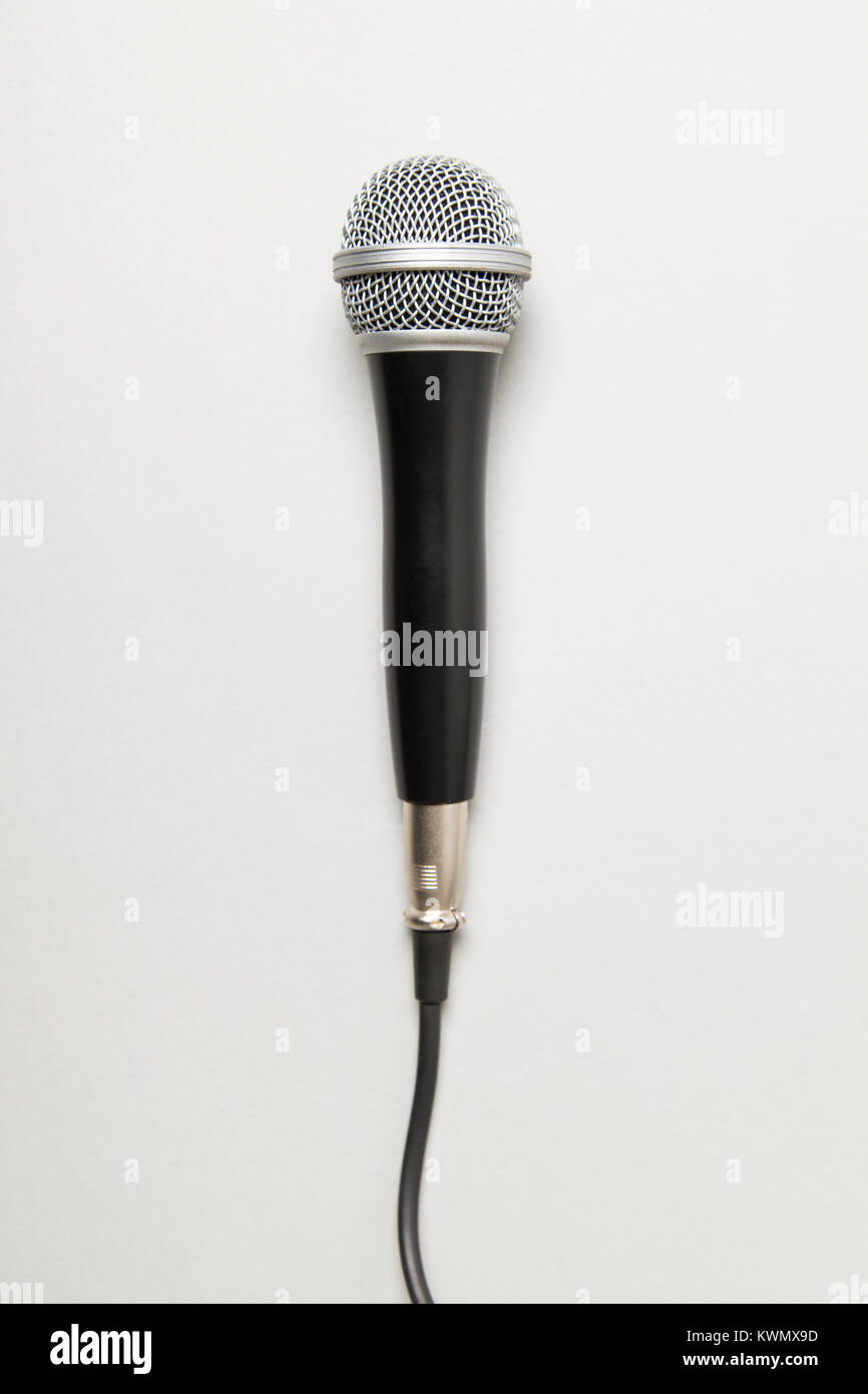 microphone and lead on a plain grey background Stock Photo - Alamy