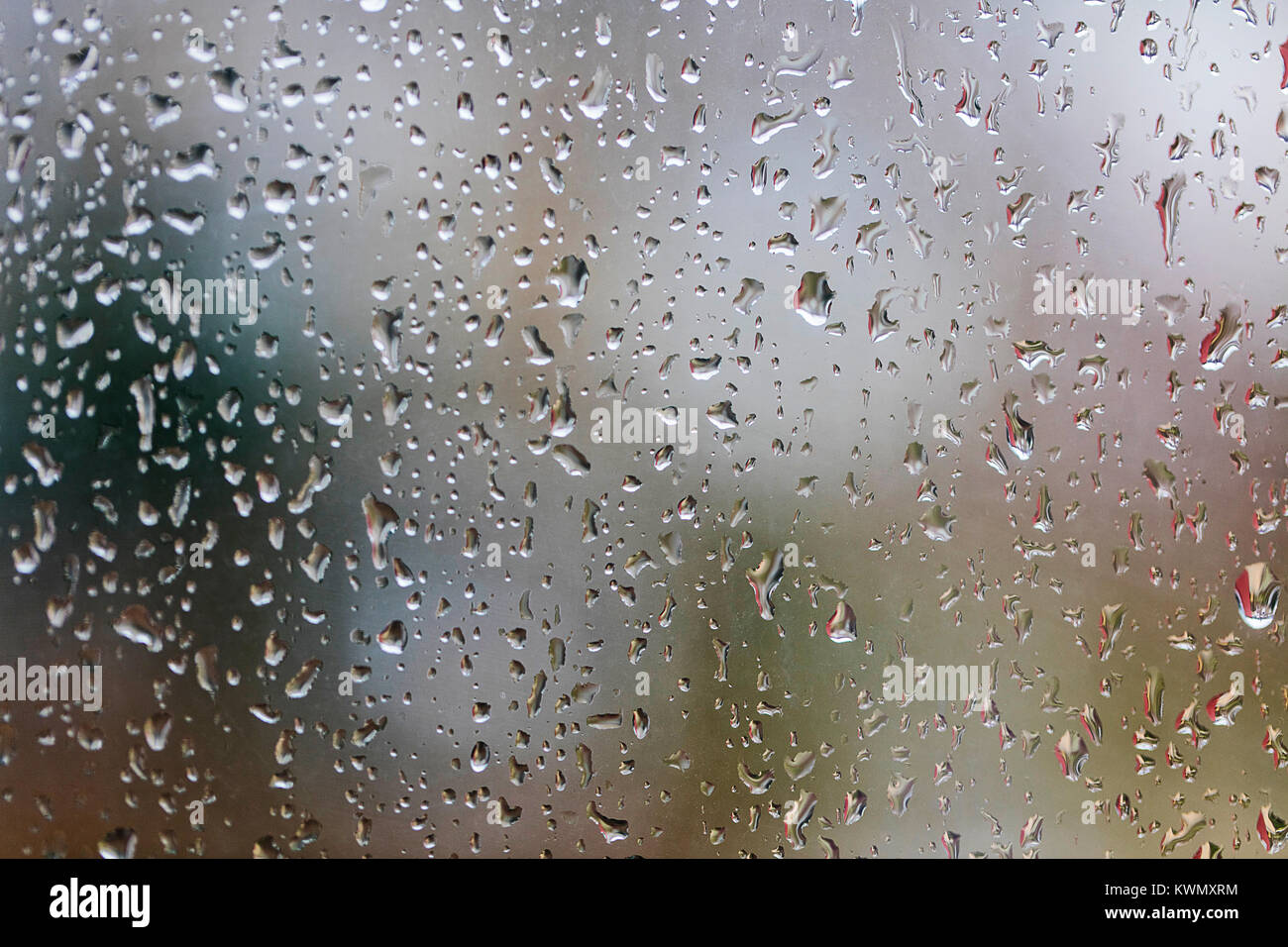 Rain drops on a window. Bad weather concept Stock Photo - Alamy