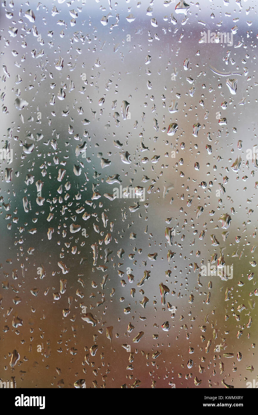 Rain drops on a window. Bad weather concept Stock Photo - Alamy