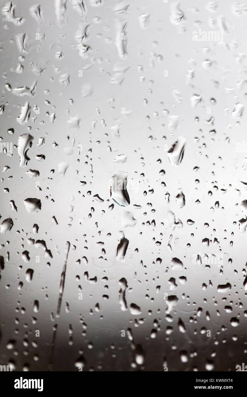 Rain drops on a window. Bad weather concept Stock Photo - Alamy