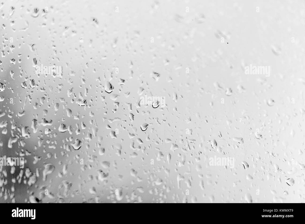 Rain drops on a window. Bad weather concept Stock Photo - Alamy