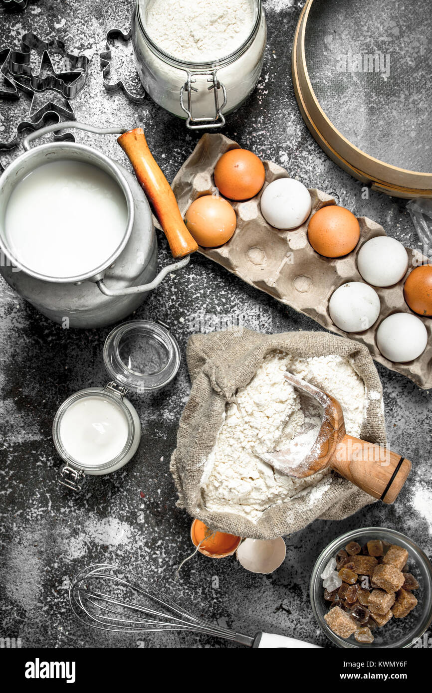 Baking background. Ingredients for the preparation of dough. On a ...