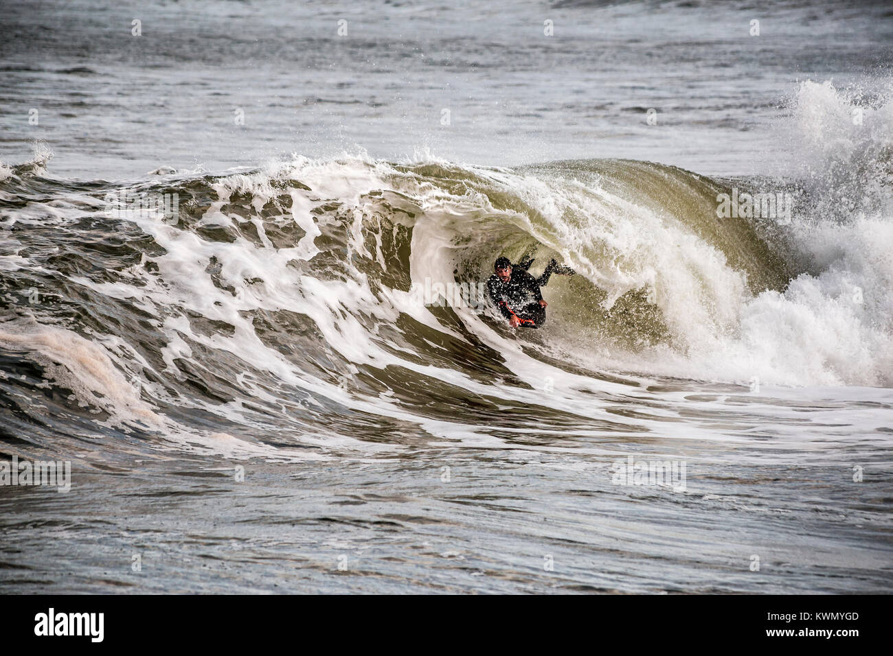 Bodyboarder getting barreled Stock Photo - Alamy