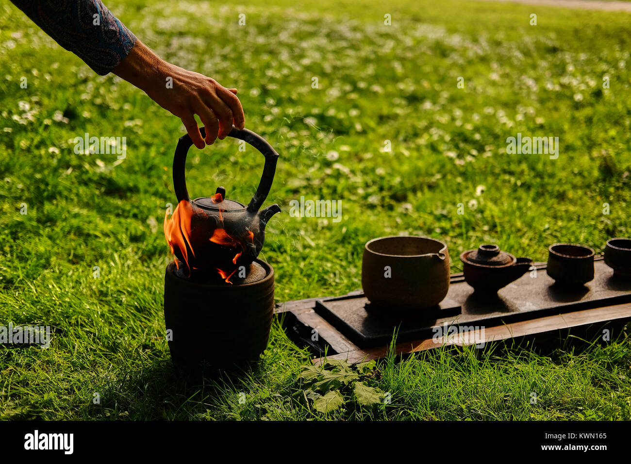 Chinese tea ceremony in a park Stock Photo - Alamy