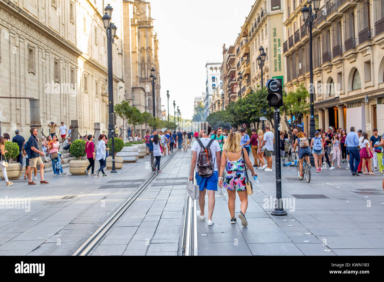 People walking during the day in a pedestrian street near Cathedral in ...