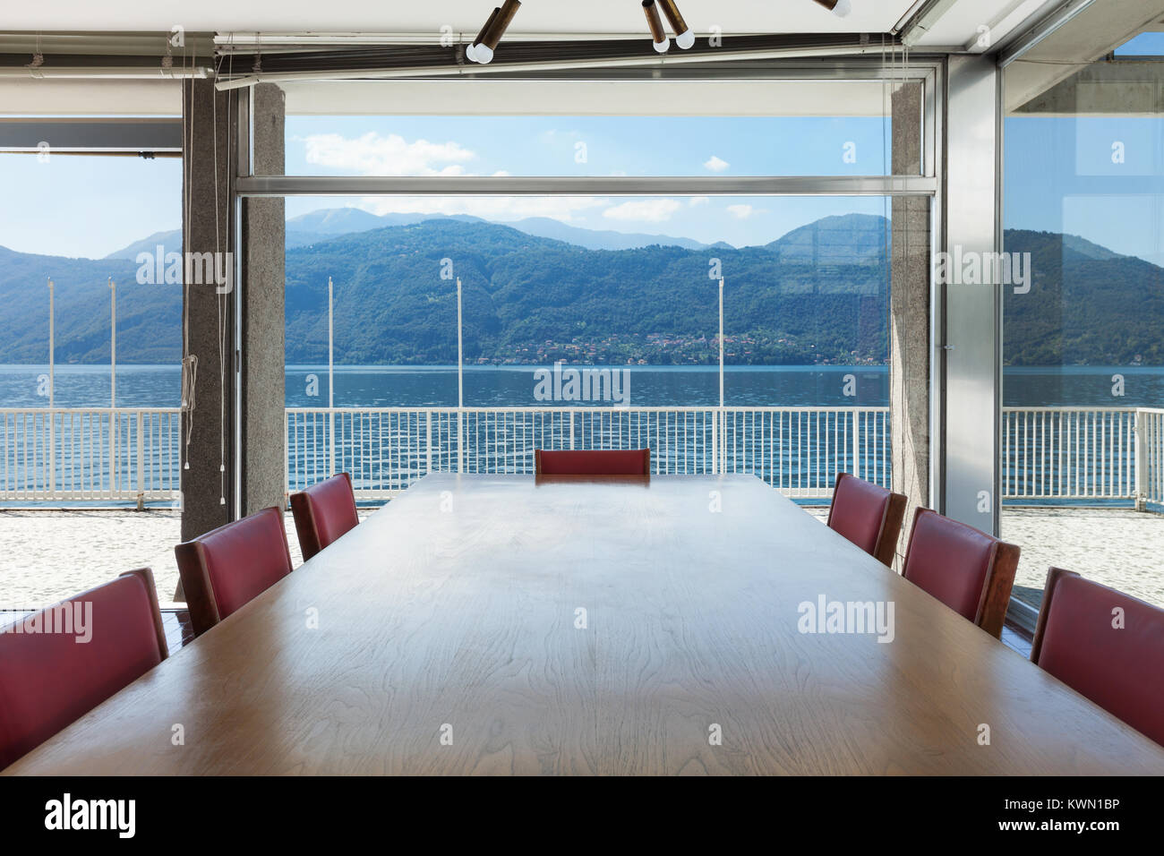 Old dining table of an attic, view from window Stock Photo - Alamy