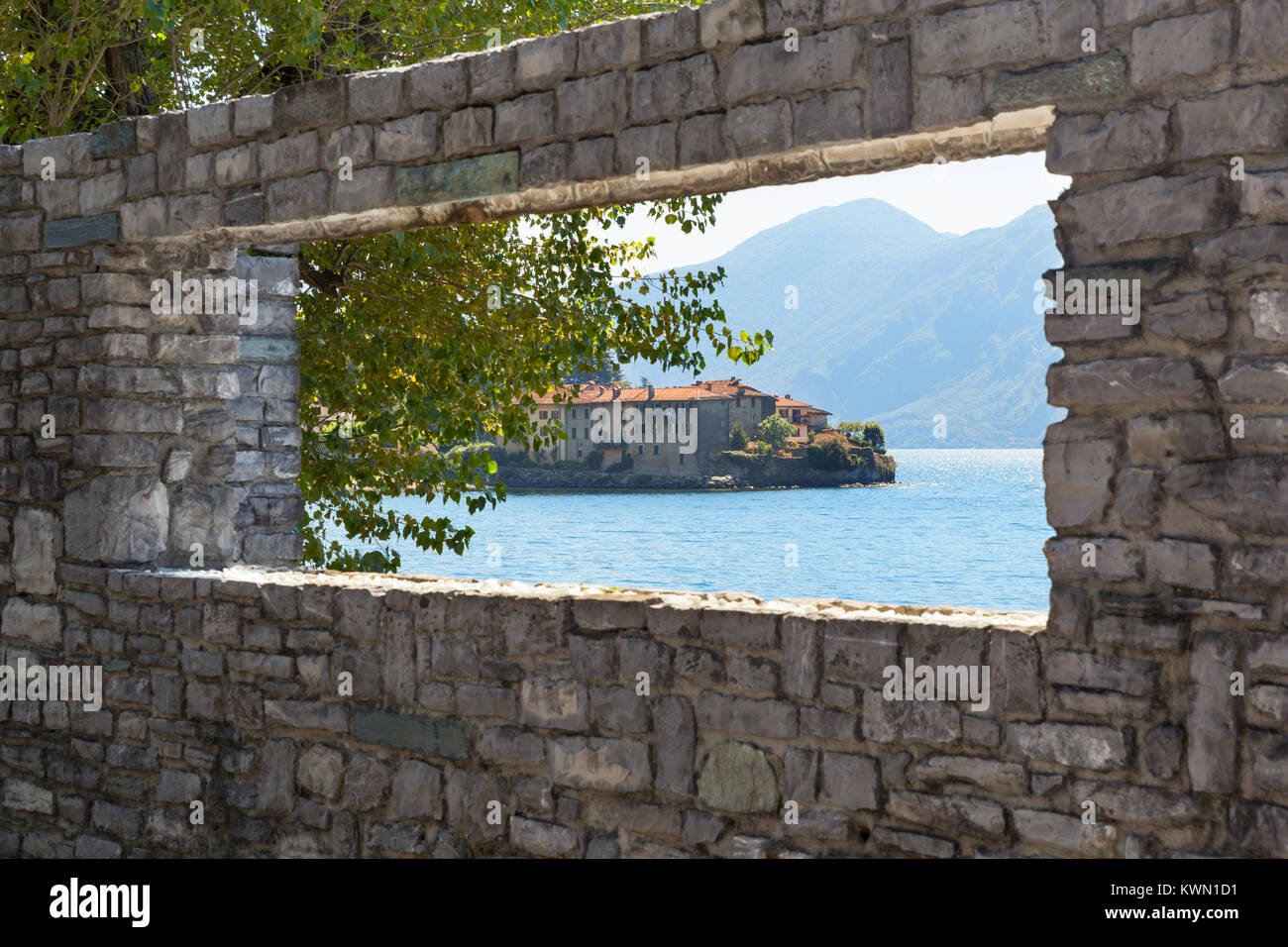 Lake view from the window of a stone wall, outdoors Stock Photo - Alamy