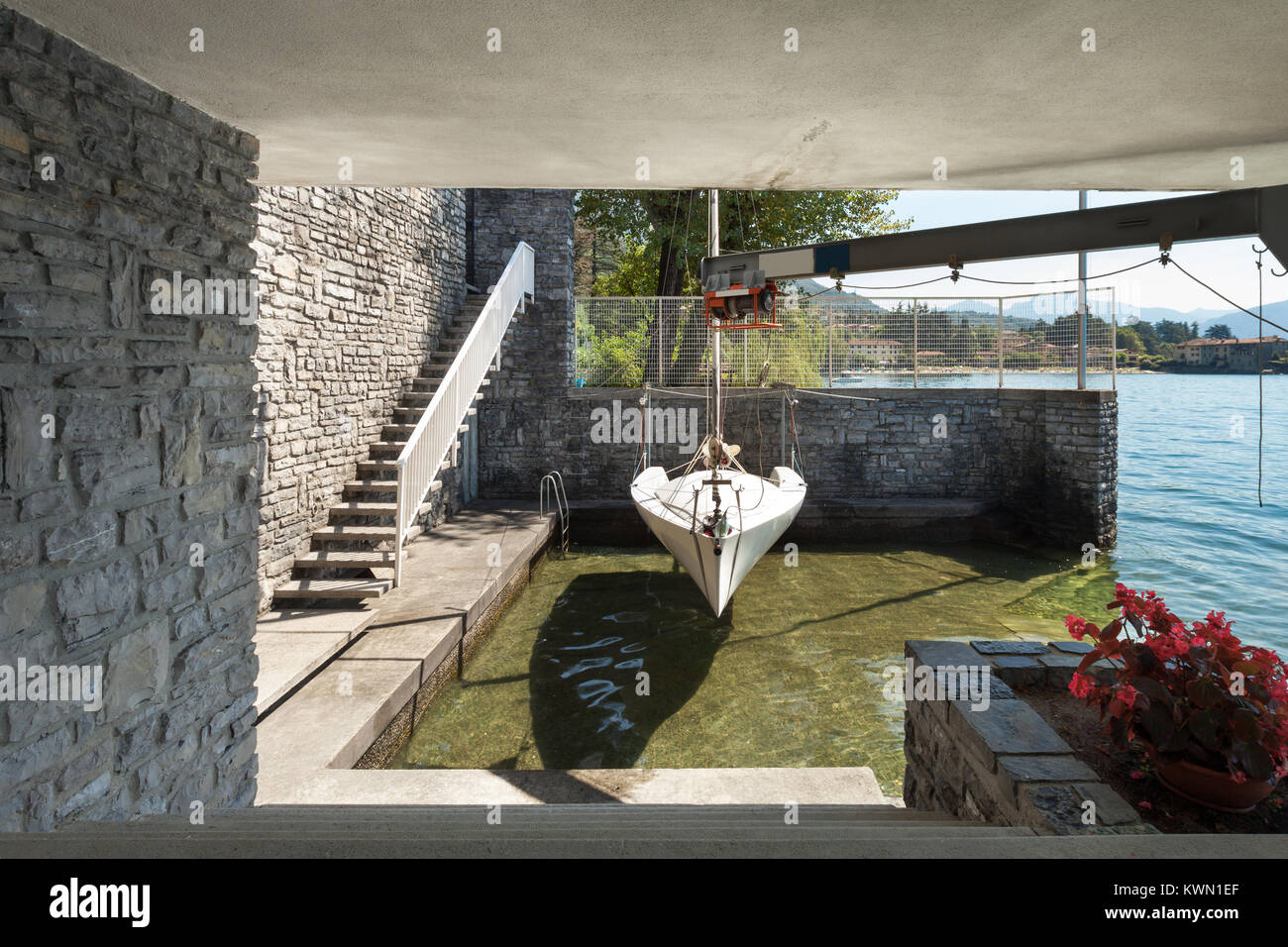 Dock on the lake of an old stone house, outdoors Stock Photo - Alamy