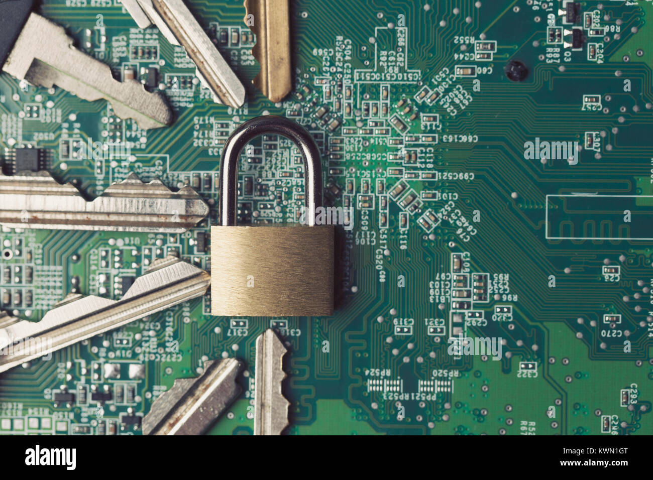 Padlock on a computer electronic circuit board. Technology security ...