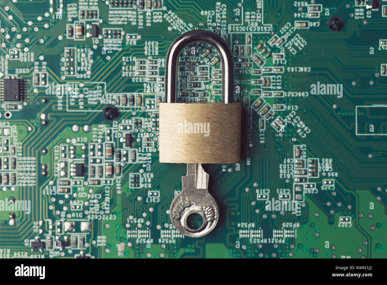 Padlock on a computer electronic circuit board. Technology security ...
