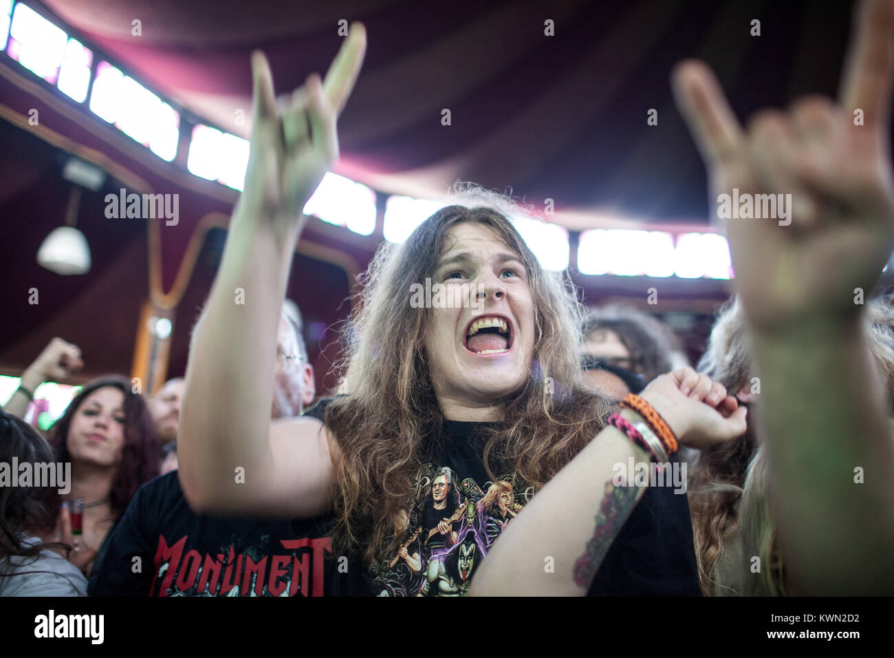 Enthusiastic hard rock and heavy metal music fans have a great time at ...