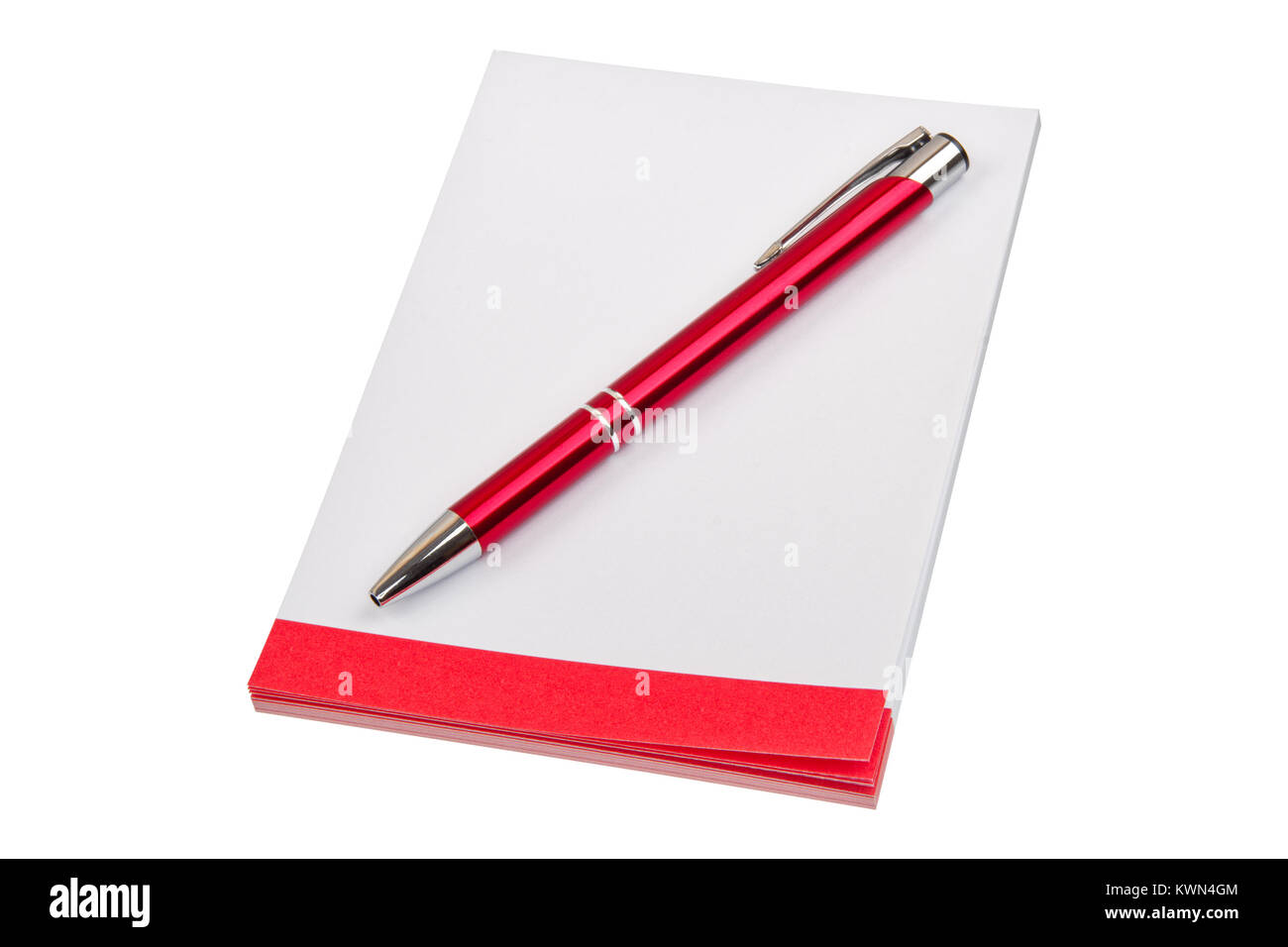 Paper block and pen isolated on a white background Stock Photo - Alamy