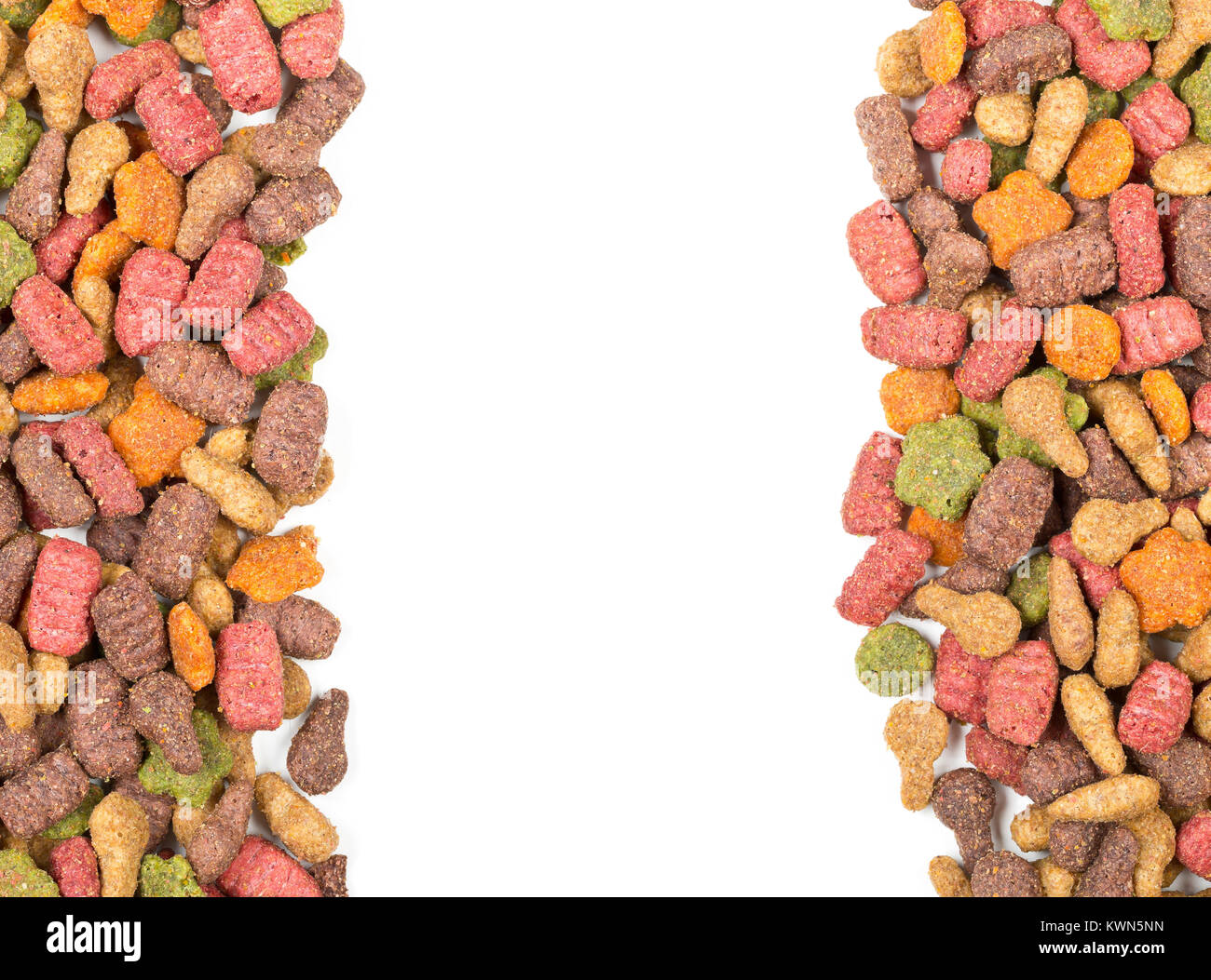 Border of dry pet food over white background Stock Photo - Alamy