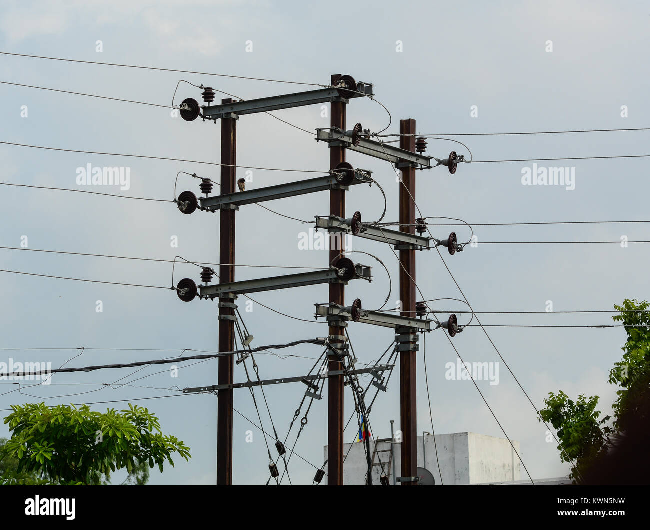 Wire electric pylon under blue sky in Gaya, India Stock Photo - Alamy