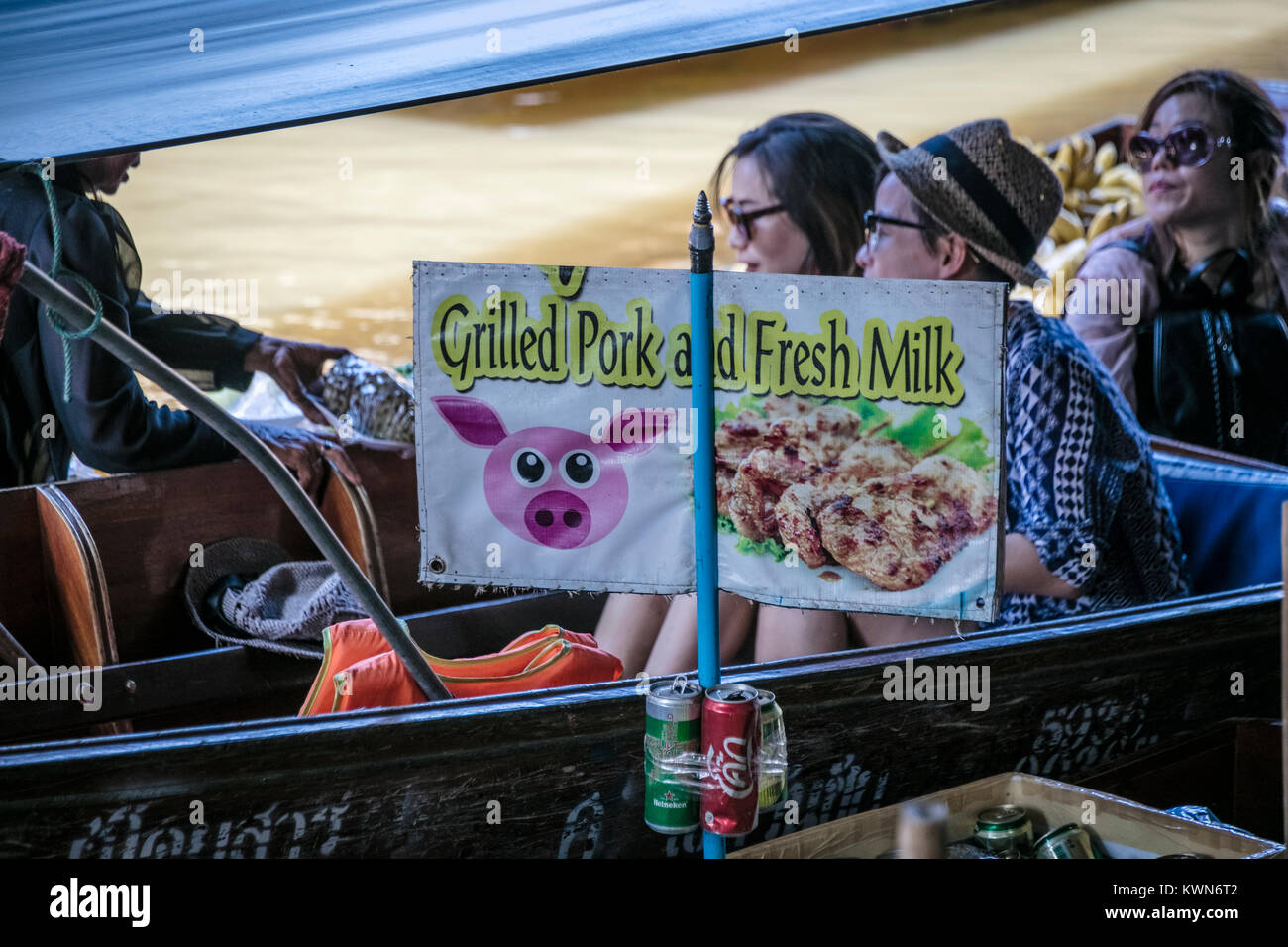 Sign for grilled pork and fresh milk in boat, Damnoen Saduk Floating ...