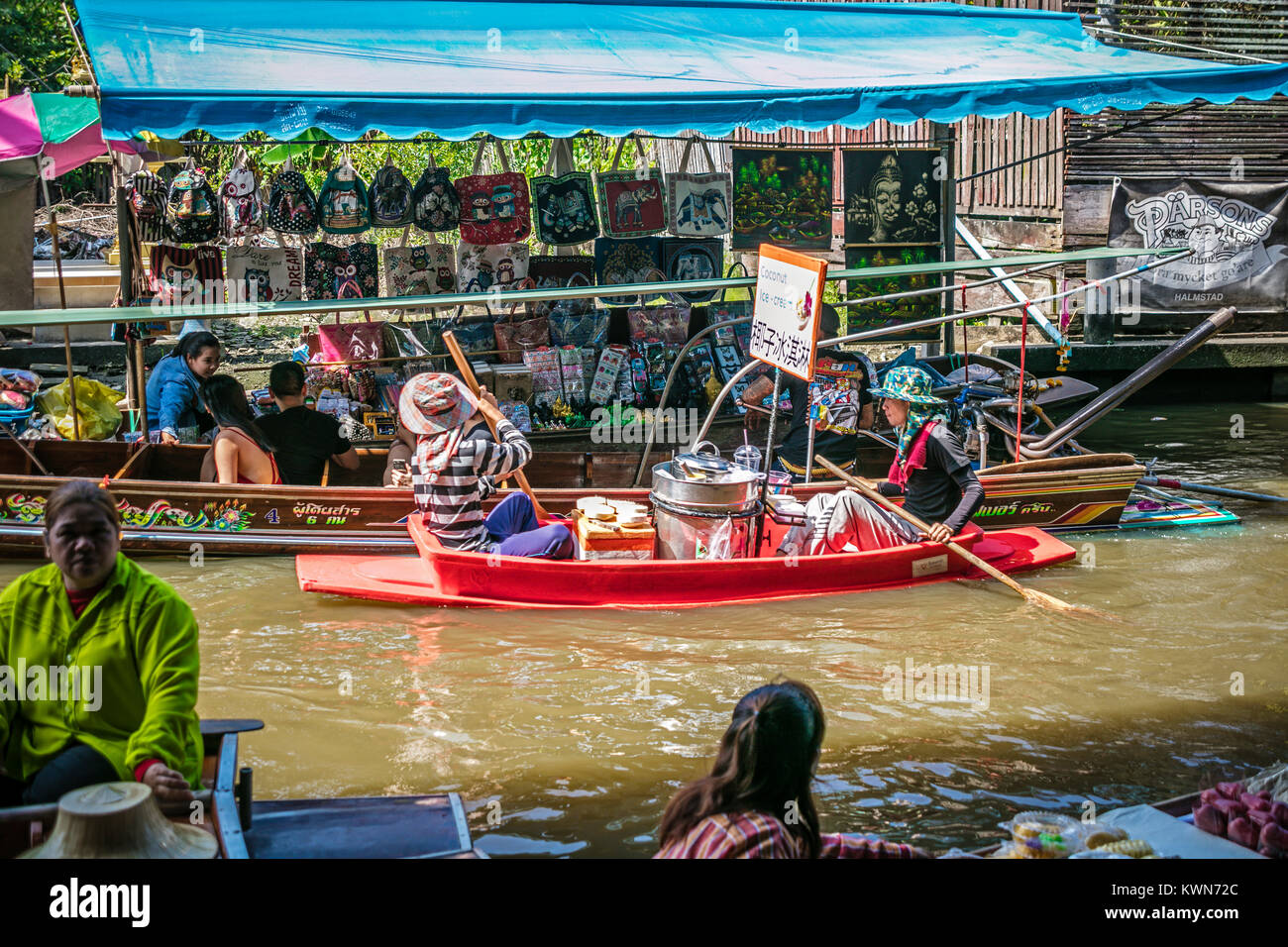 Thai ice cream sellers in boat, Damnoen Saduk Floating Market, Thailand ...
