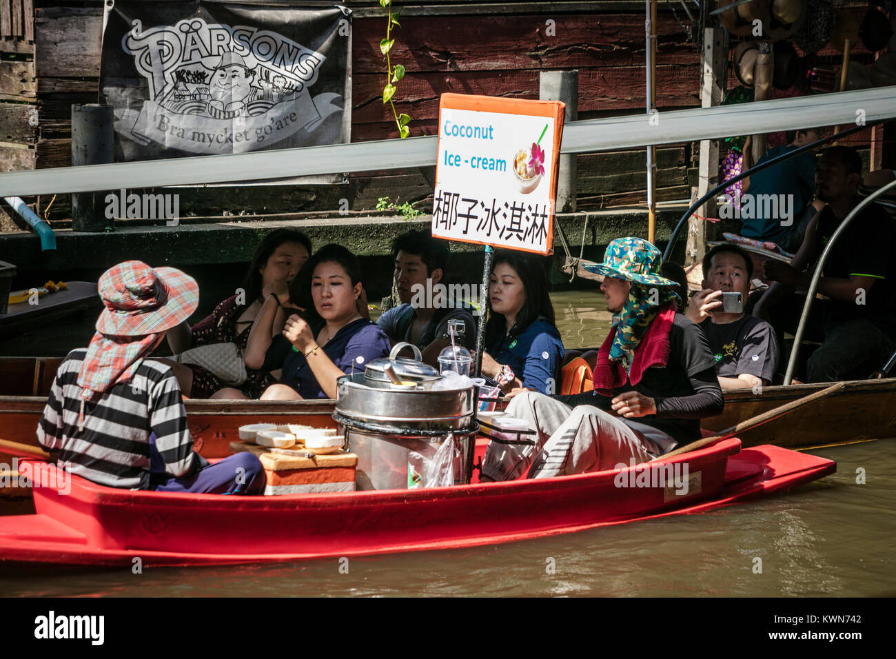 Thai ice cream sellers in boat, Damnoen Saduk Floating Market, Thailand ...