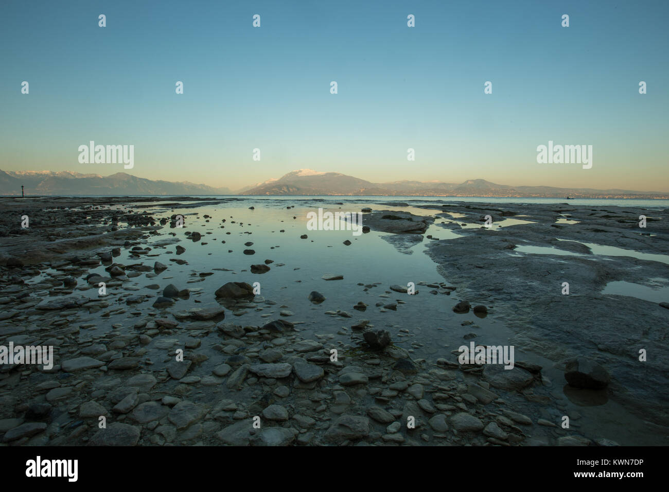 View of the beaches near the lakeside promenade of the Sirmione ...