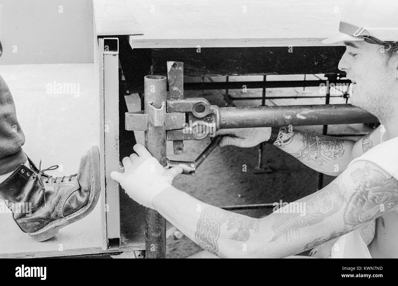 Edwin Shirley Staging crew building a stage in Wembley Stadium for the ...