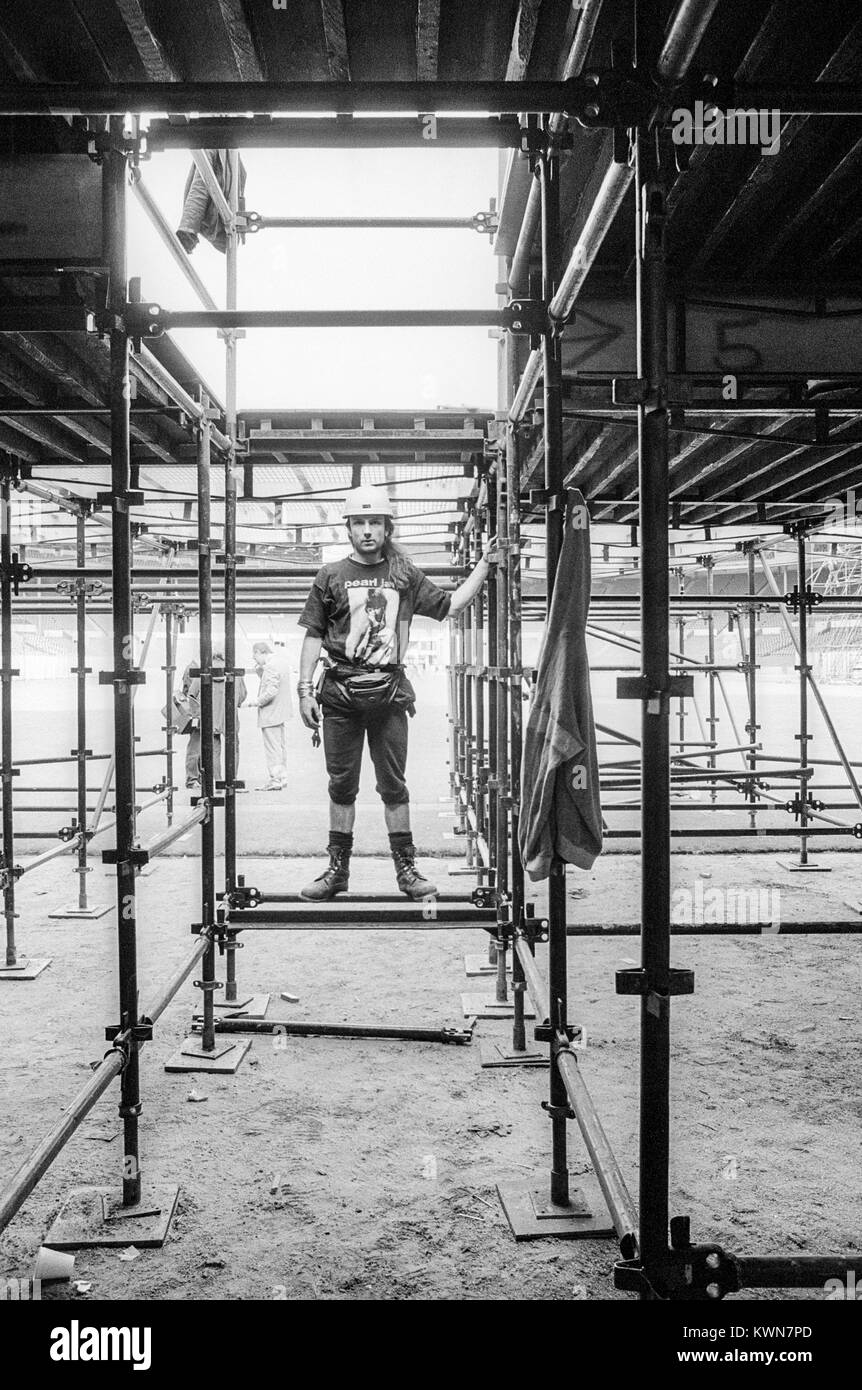 Edwin Shirley Staging crew building a stage in Wembley Stadium for the ...