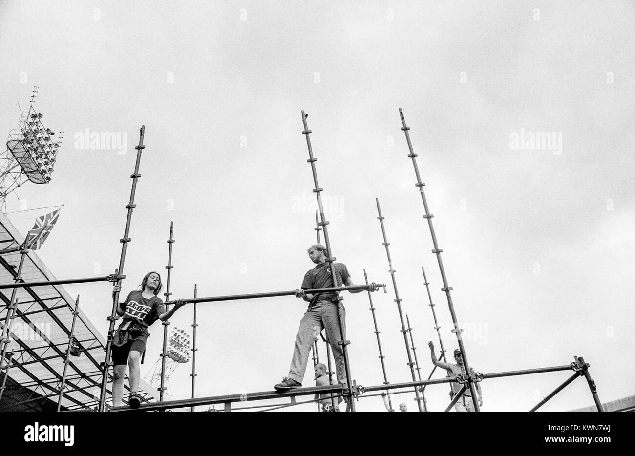 Edwin Shirley Staging crew building a stage in Wembley Stadium for the ...