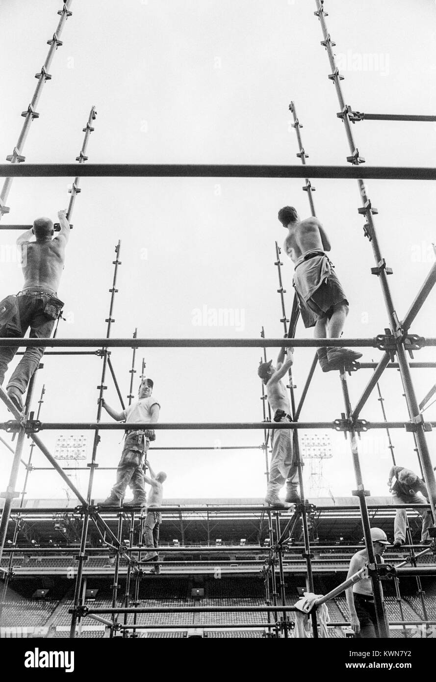 Edwin Shirley Staging crew building a stage in Wembley Stadium for the ...