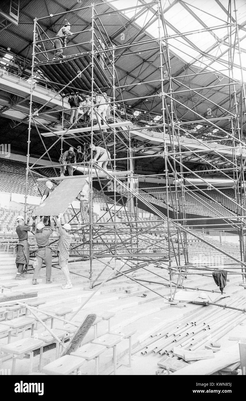 Edwin Shirley Staging crew building a stage in Wembley Stadium for the ...