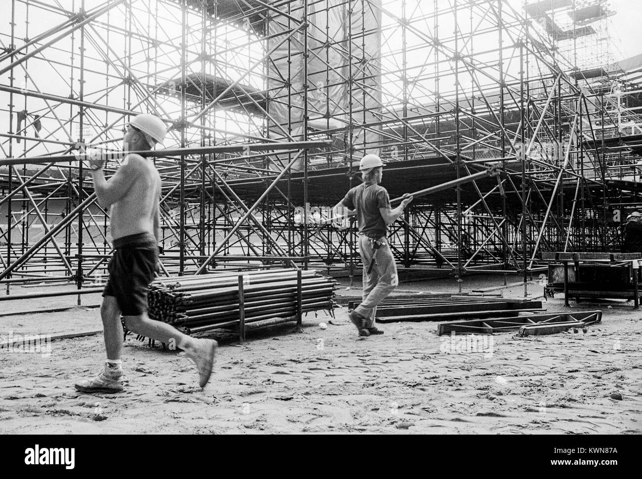 Edwin Shirley Staging crew building a stage in Wembley Stadium for the ...