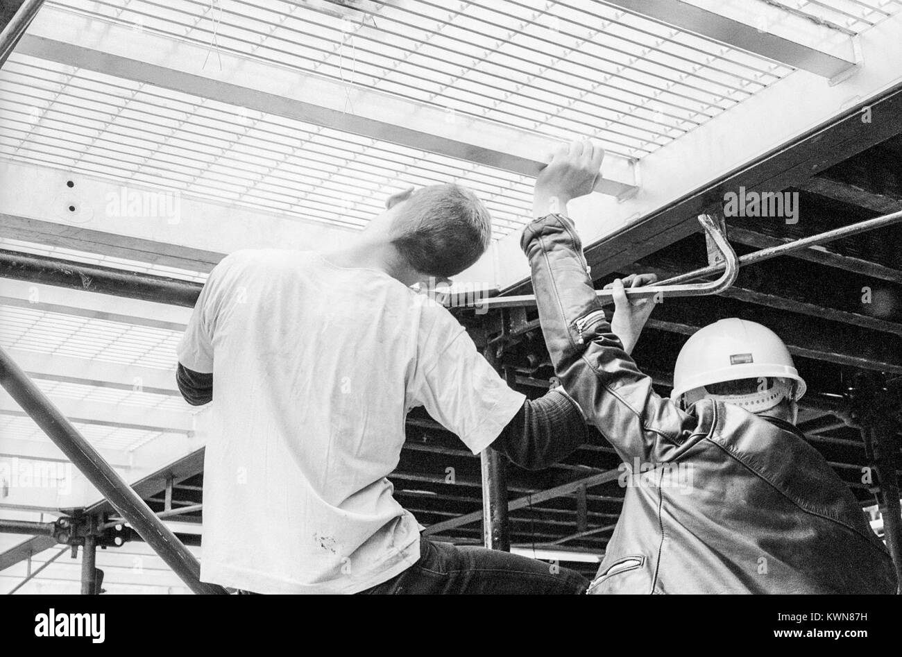 Edwin Shirley Staging crew building a stage in Wembley Stadium for the ...