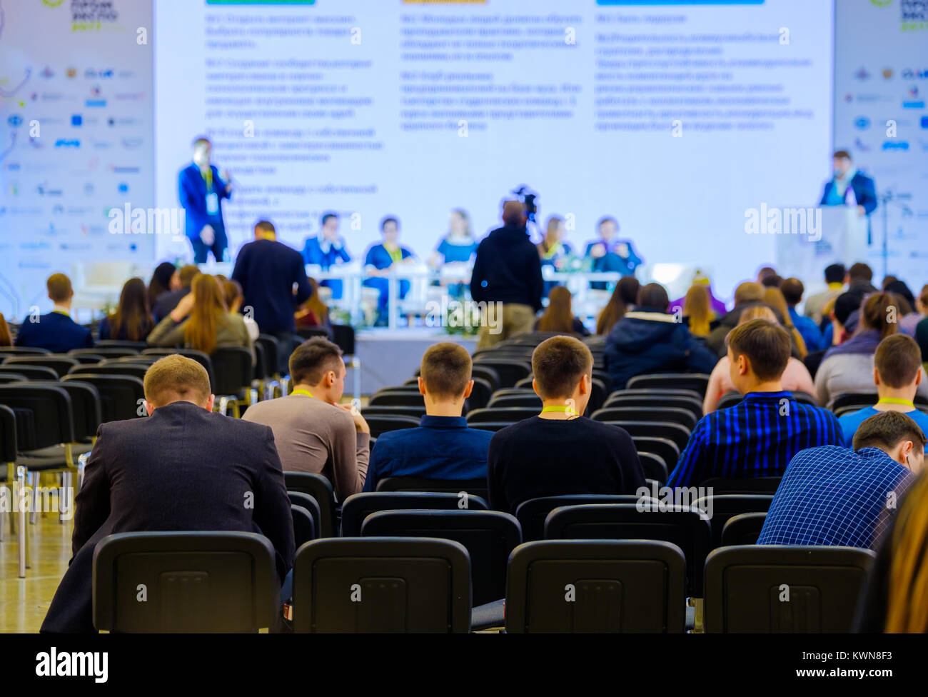 People attend business conference in congress hall Stock Photo - Alamy