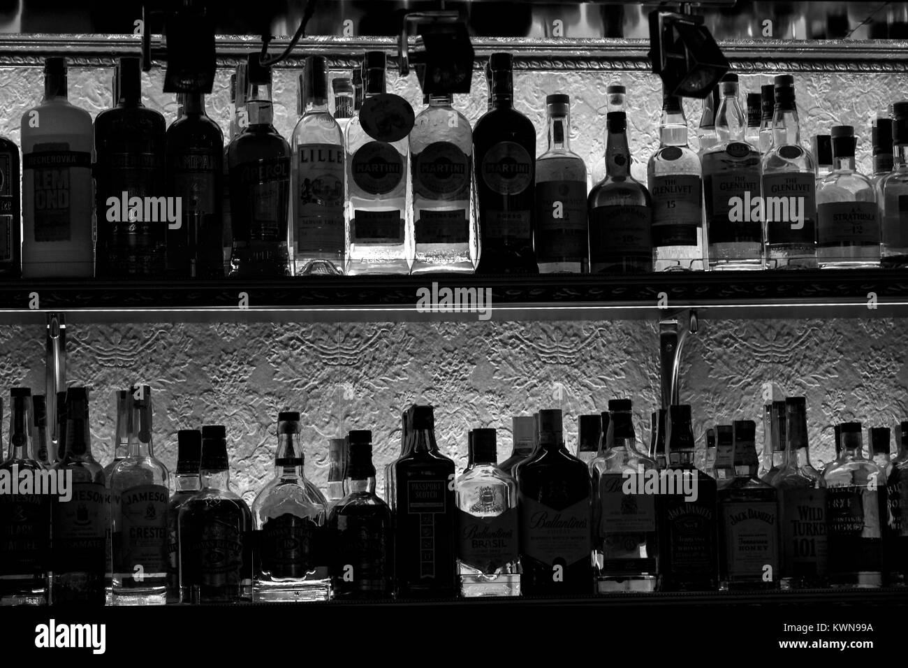 KHARKOV, UKRAINE- 25 OCTOBER 2017: Silhouettes of bottles with alcohol ...