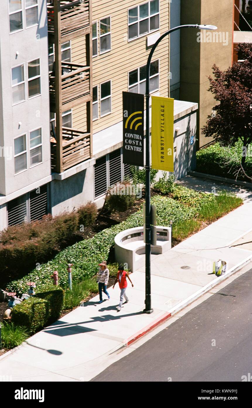 Aerial view of two people walking along a sidewalk in Contra Costa ...