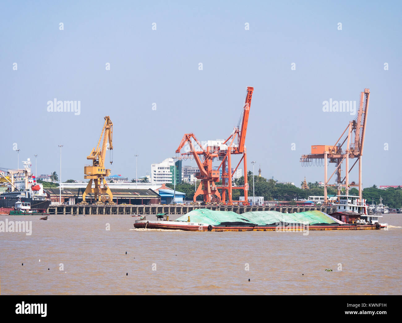 Yangonâ€™s commercial harbour along the Yangon River in Yangon, Myanmar ...