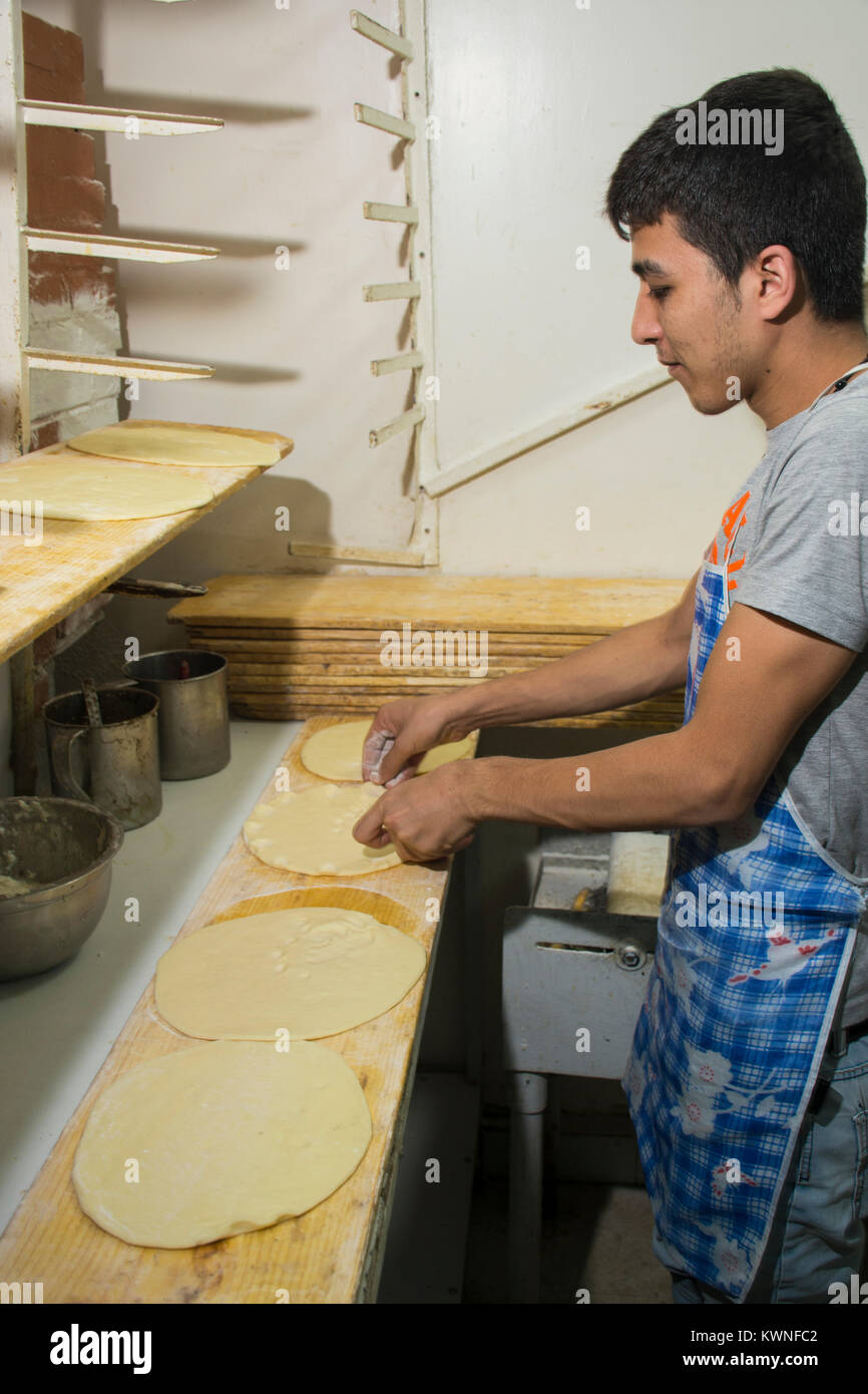 Boy working bakery hi-res stock photography and images - Alamy