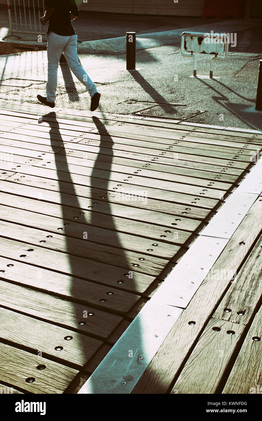 Man running away danger hi-res stock photography and images - Alamy