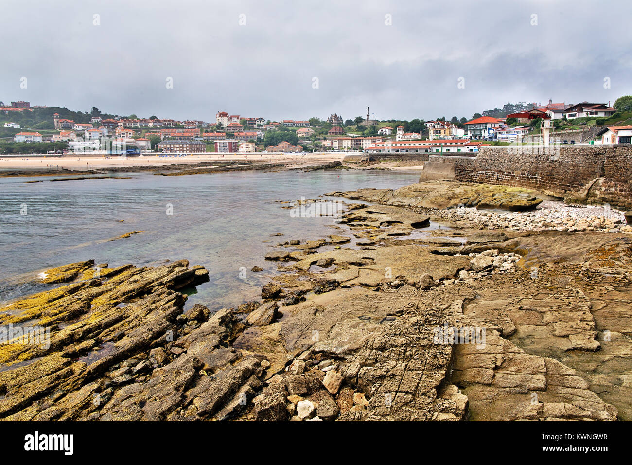 View of the city Comillas from the ocean during an outflow. Cloudy ...