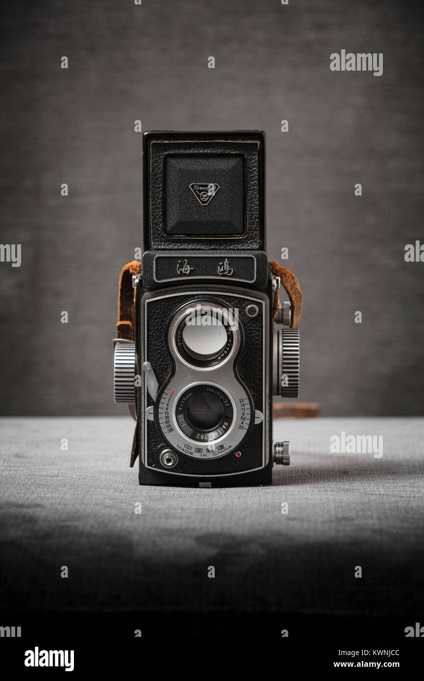 A Seagull 4 TLR Twin Lens Reflex Camera with brown strap on a grey ...