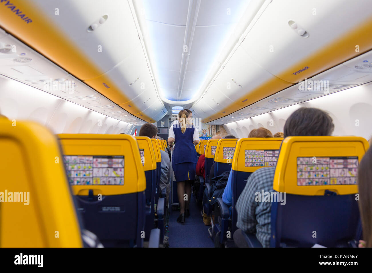 Stewardess serving passangers on Ryanair airplane flight on 14th of ...