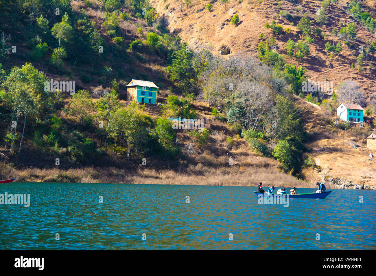 Beautiful Village Lake and Boat Stock Photo - Alamy