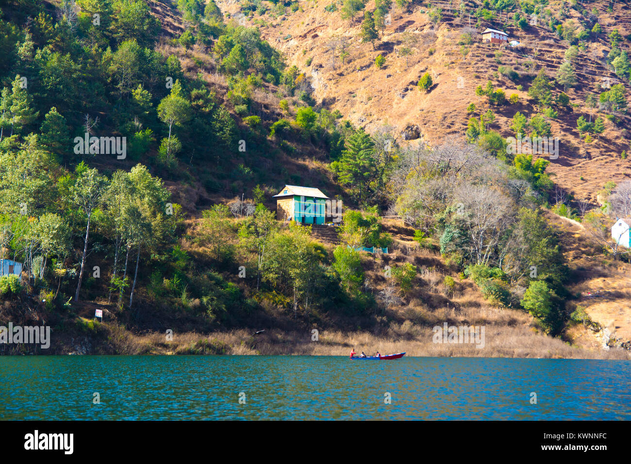 Beautiful Village Lake and Boat Stock Photo - Alamy