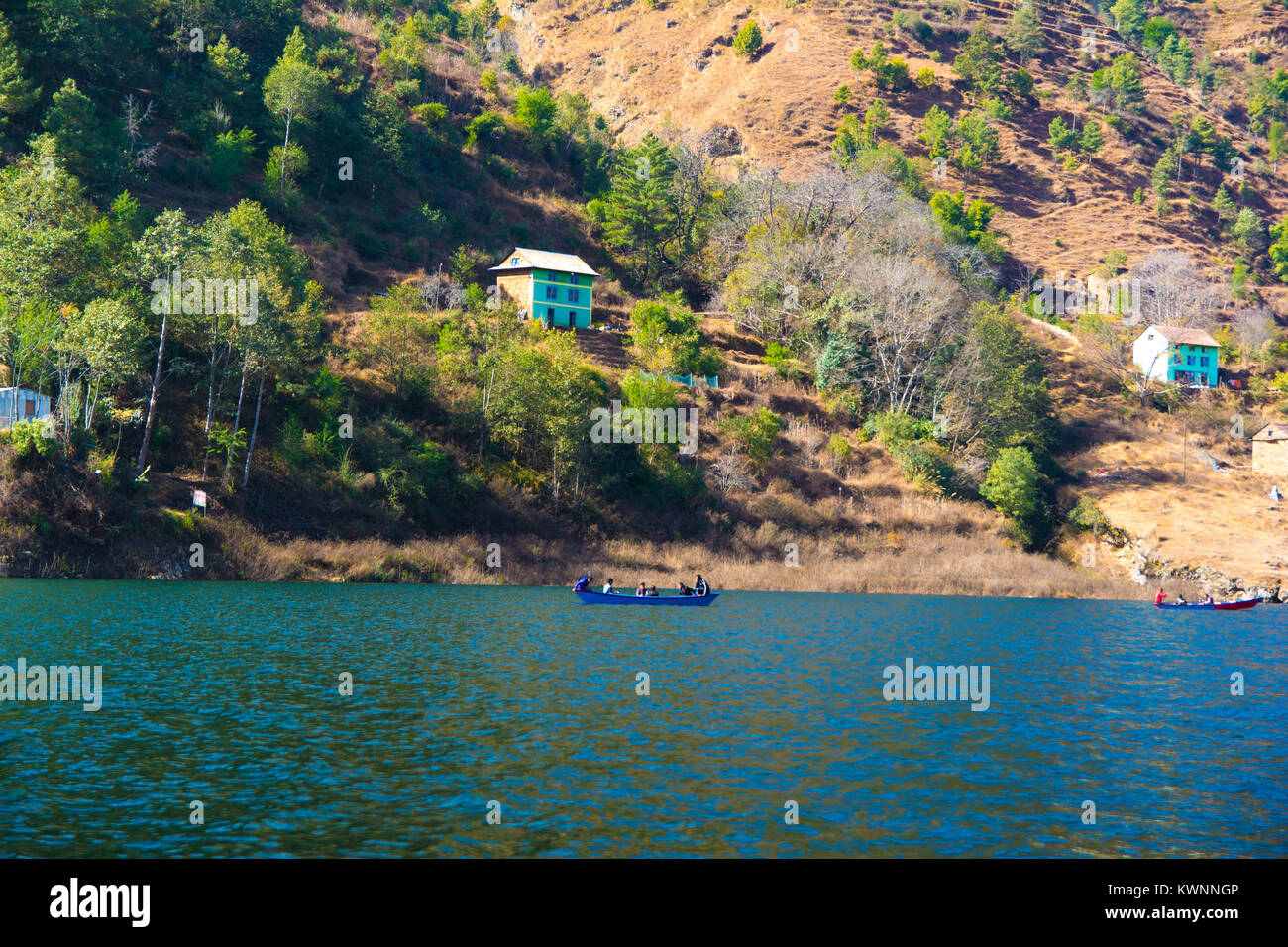 Beautiful Village Lake and Boat Stock Photo - Alamy