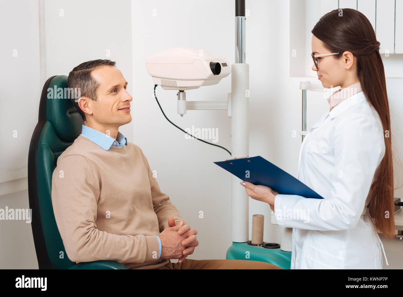 side view of patient at the oculists reception in clinic Stock Photo ...