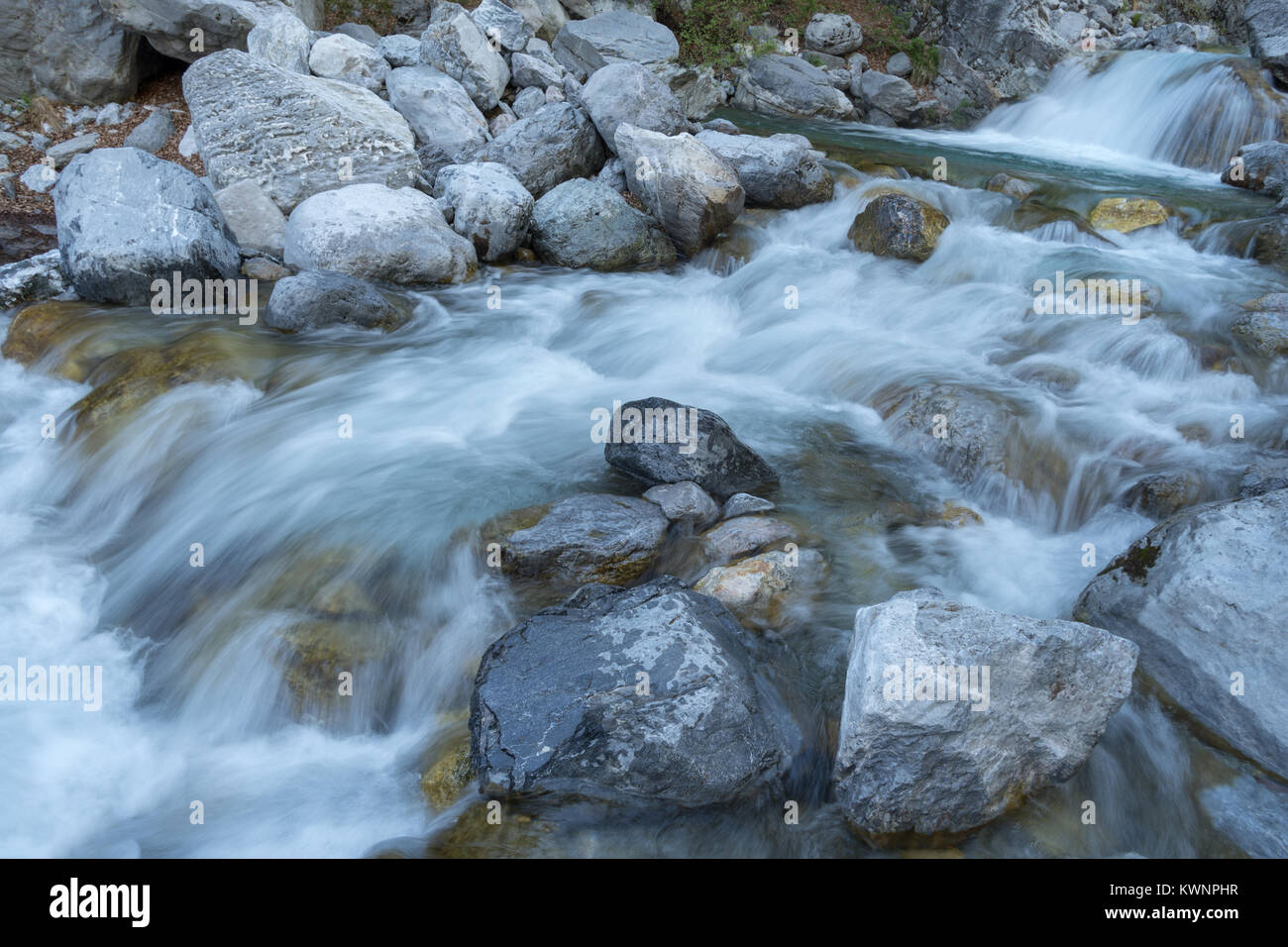 Running over rocks hi-res stock photography and images - Alamy
